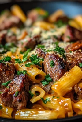 Creamy Smoky BBQ Steak and Cheddar Pasta Skillet